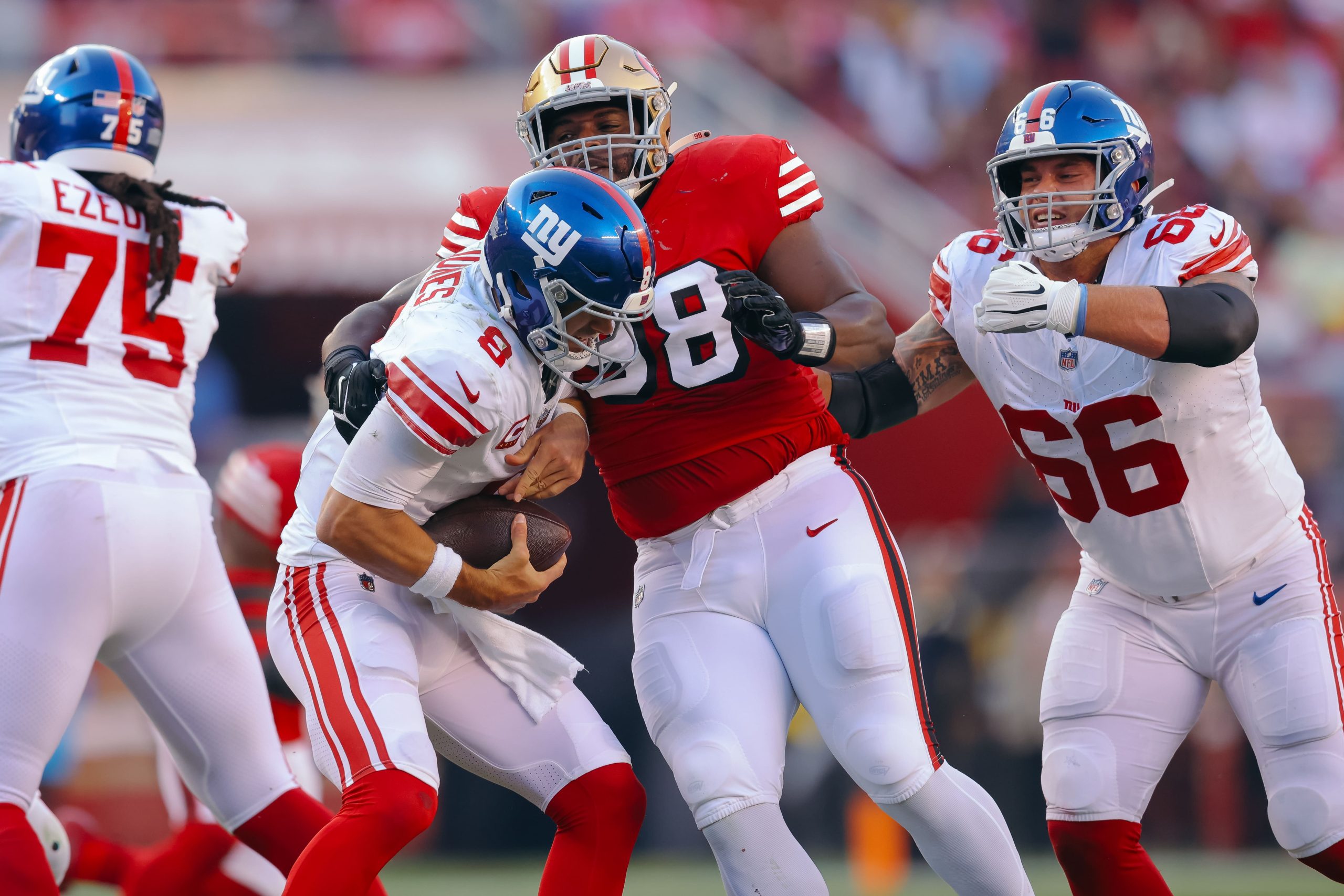 The Giants blitzed Purdy hard, who converted 247 of his 310 passing ...